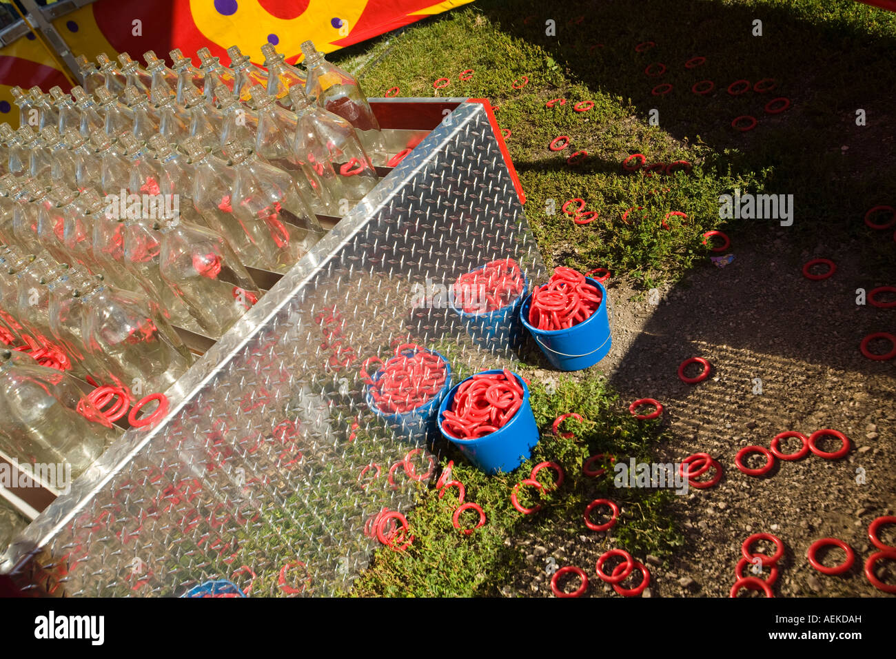 ILLINOIS Grayslake Buckets of rings and glass bottles in row ring toss ...