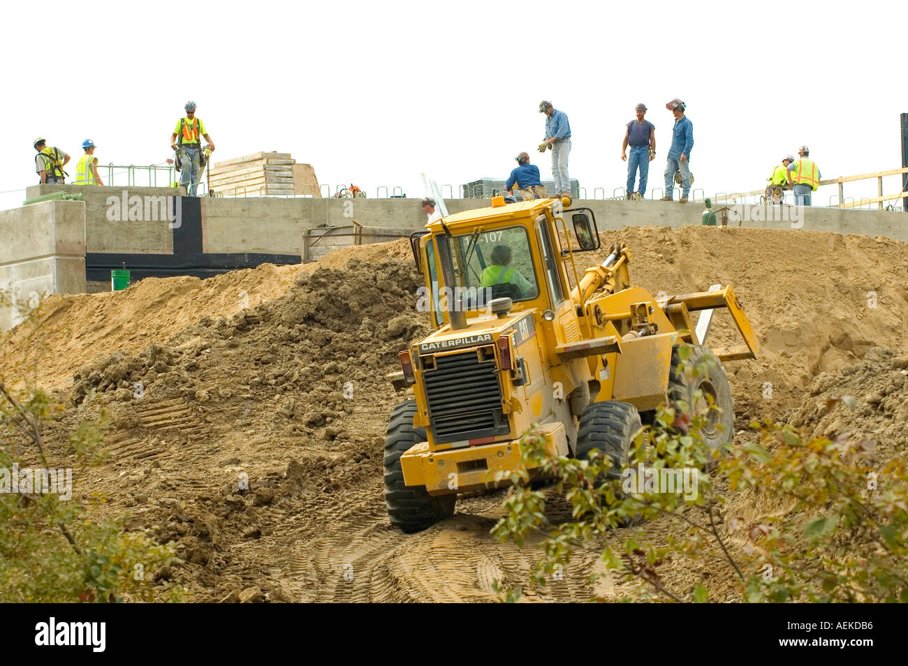 Road Construction workers build a bridge over highway Interstate I 94 ...