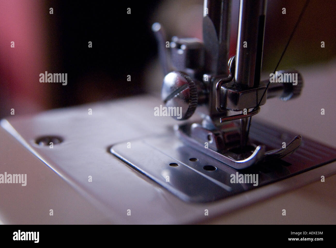 Close up of the needle area of a modern sewing machine Stock Photo - Alamy