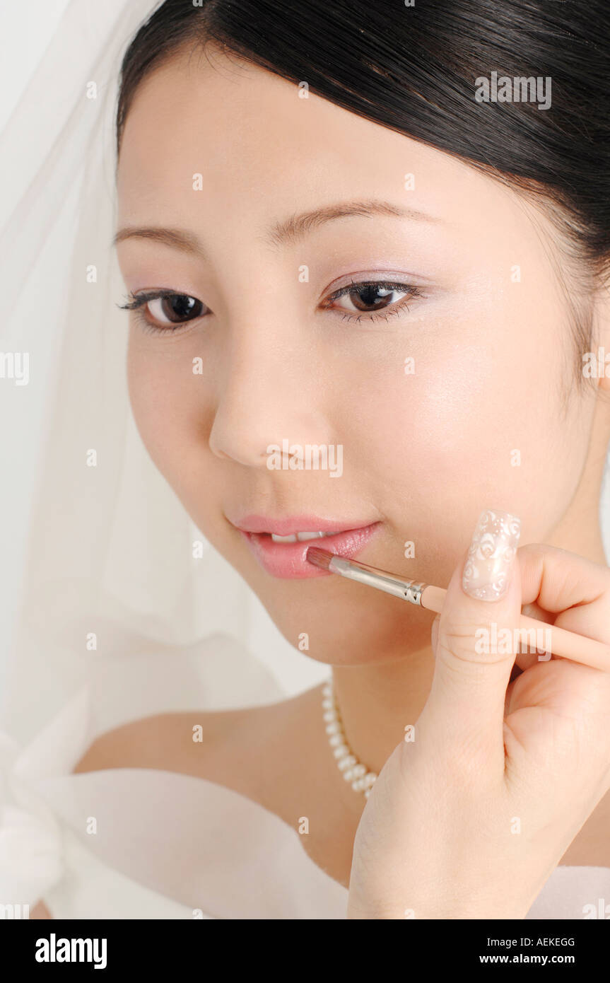 Bride who does makeup Stock Photo - Alamy