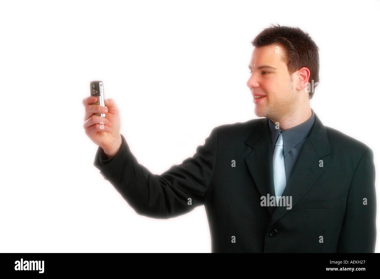 man taking picture with mobile phone Stock Photo - Alamy