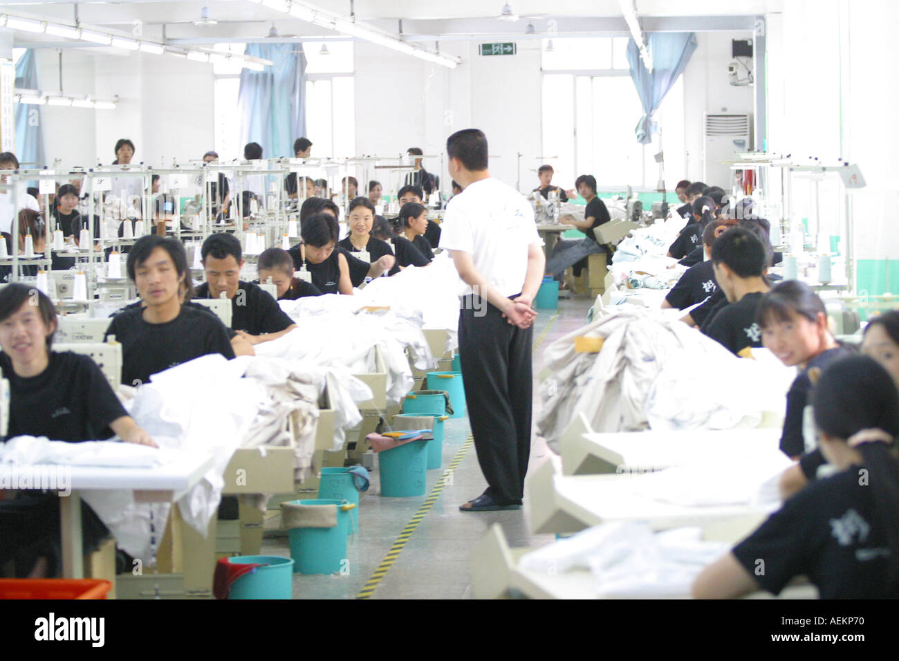 Chinese sweat shop hi-res stock photography and images - Alamy