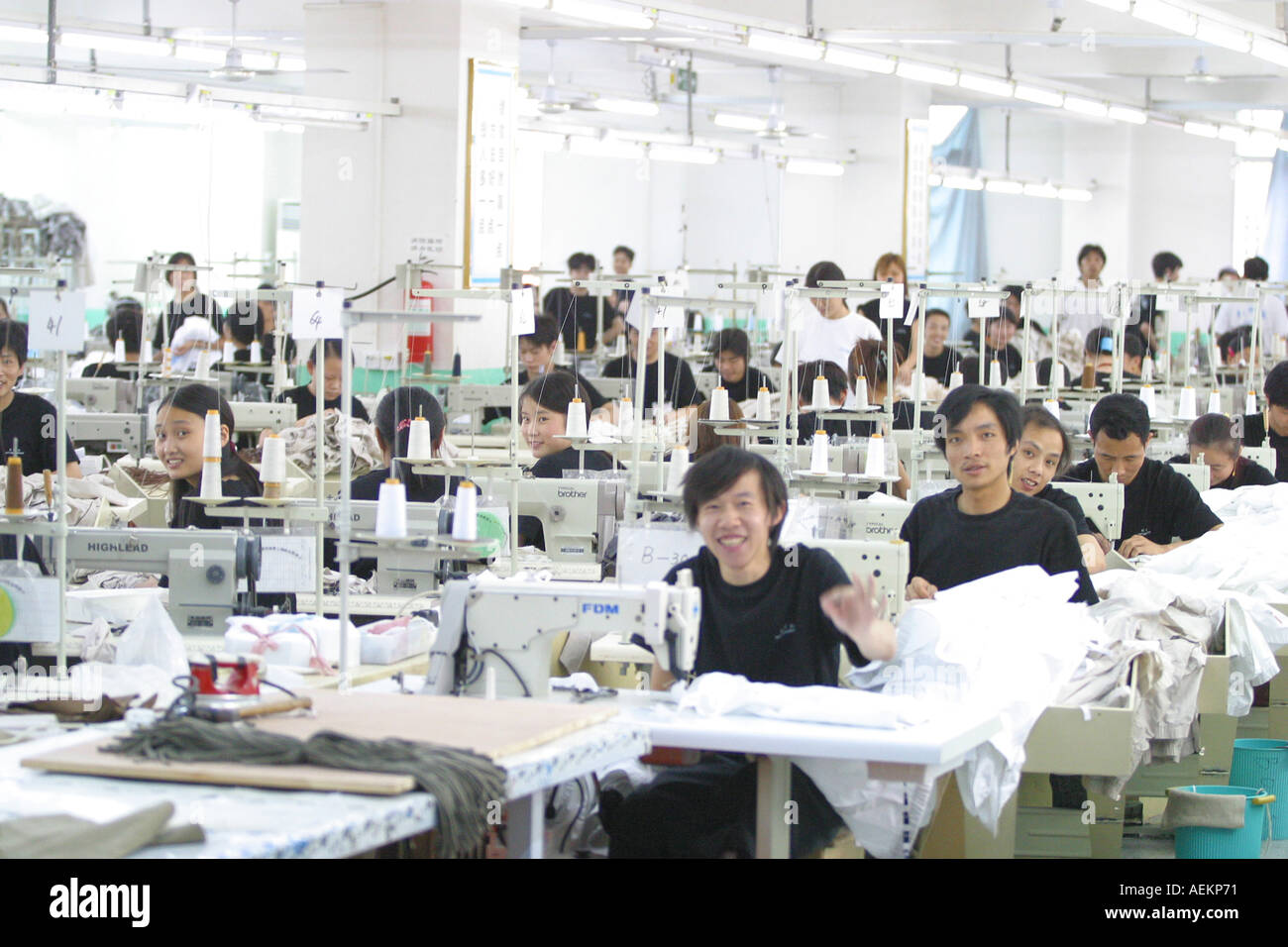 Sweat shops sewing hi-res stock photography and images - Alamy