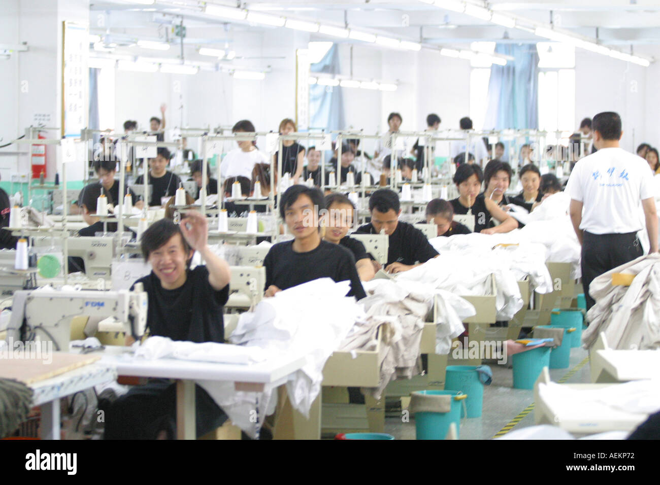 Chinese sweat shop hi-res stock photography and images - Alamy
