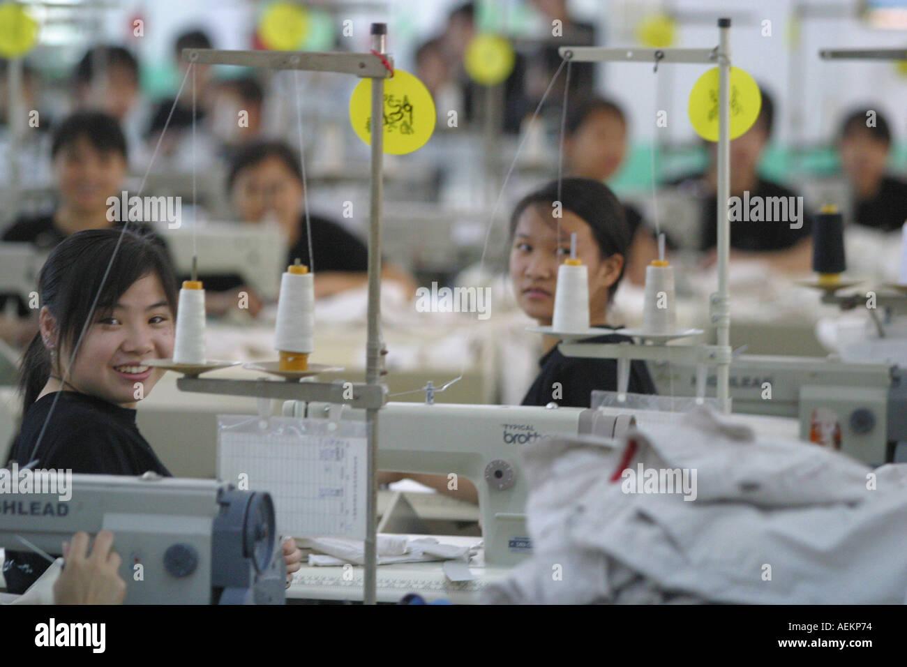 Chinese sweat shop hi-res stock photography and images - Alamy