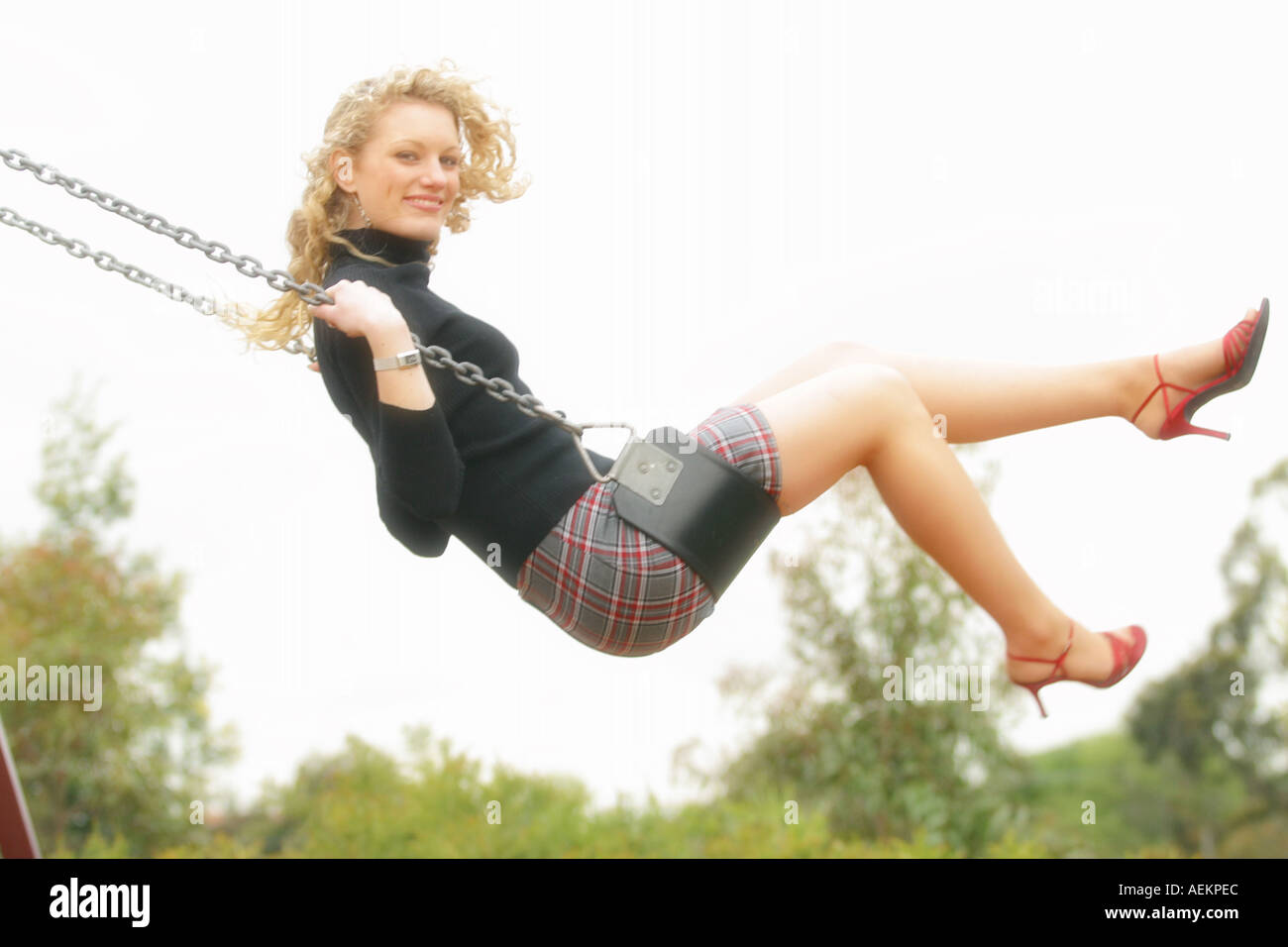 woman on swing Stock Photo - Alamy