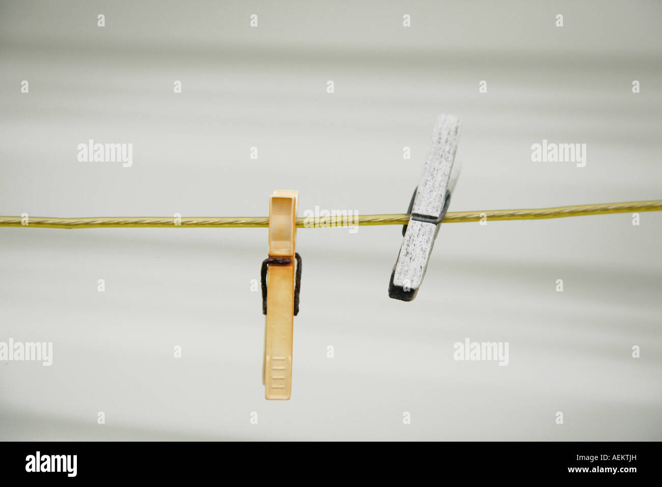 two pegs on an empty washing line Stock Photo - Alamy