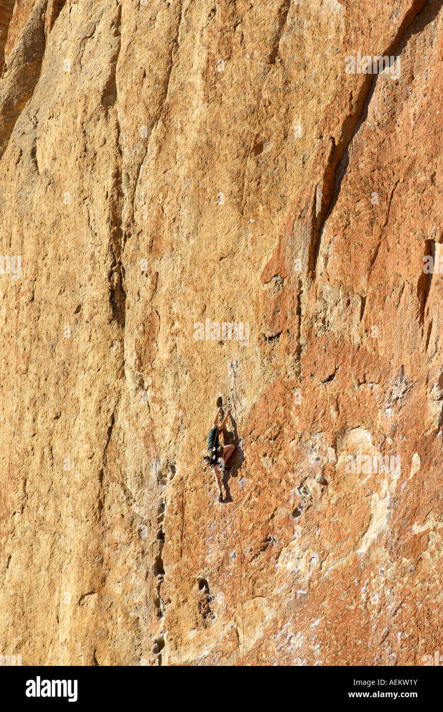 Rock climber going up rock face Smith Rock State Park Central Oregon ...