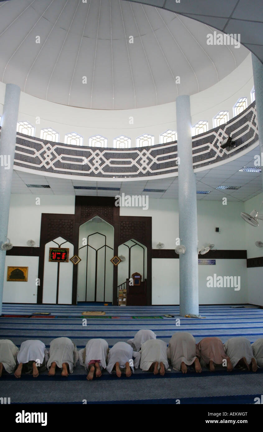 Muslim men praying inside a Mosque in Malaysia Stock Photo - Alamy