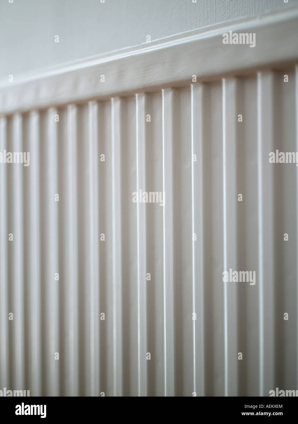 White radiator with vertical lines Stock Photo - Alamy