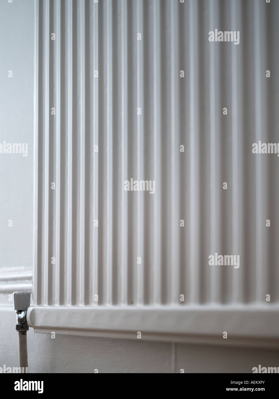 White radiator with vertical lines Stock Photo - Alamy