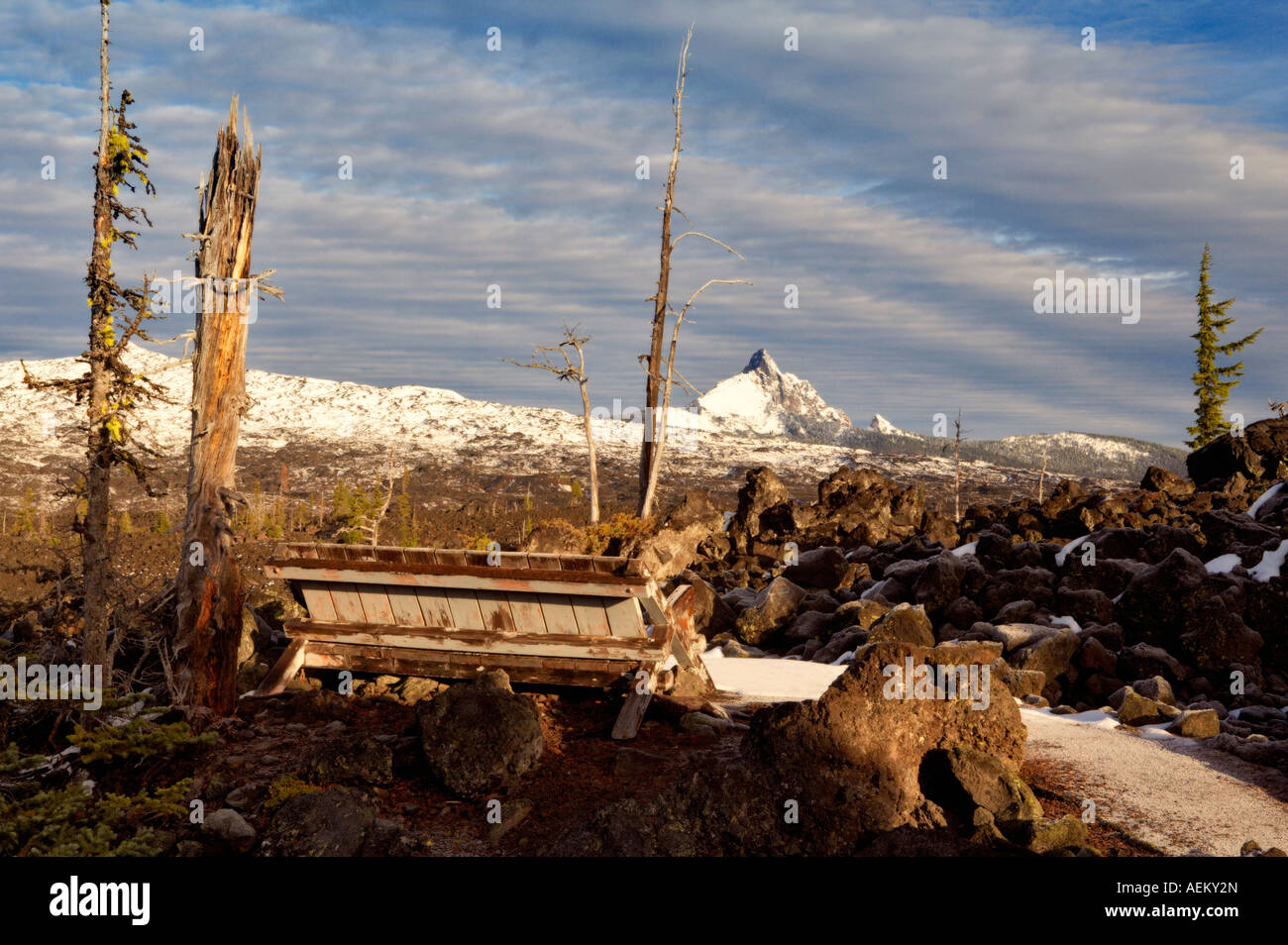 Bench on trail at Dee Wright Observatory with Mt Washington Central ...