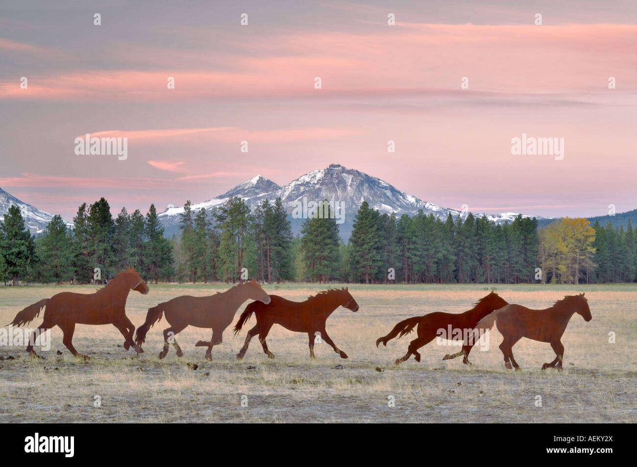 Iron horse sculpture with Three Sisters Mountains Oregon Stock Photo ...