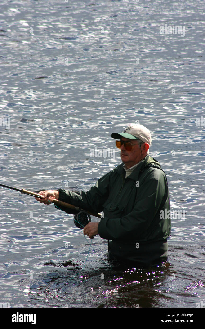 Angler fishing for salmon in in the River Moy, Ballina, County Mayo ...