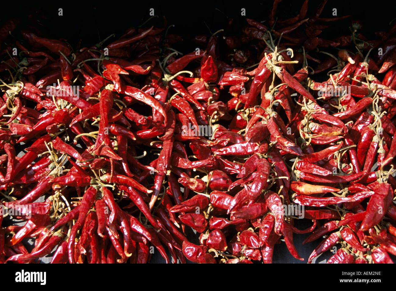 Dried chilli peppers outside grocery shop Stock Photo - Alamy