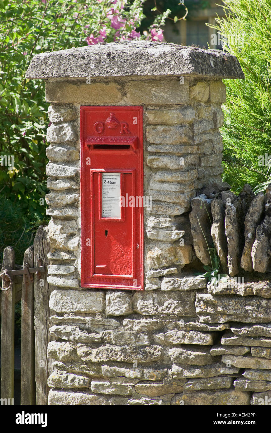postbox in wall outside house in village Stock Photo - Alamy
