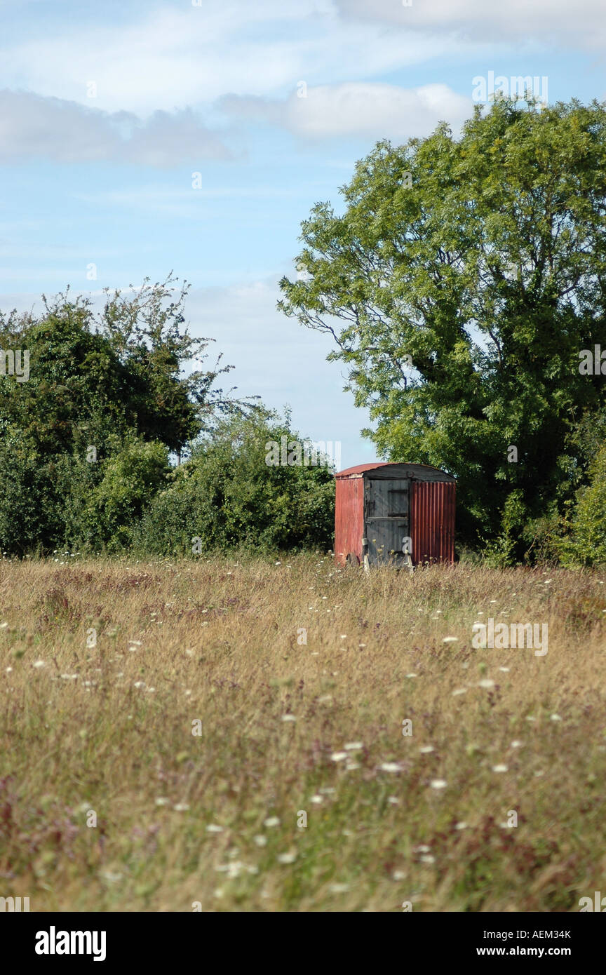 Shed in field Stock Photo - Alamy