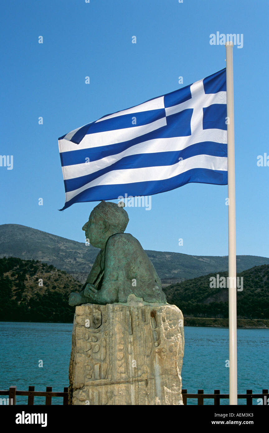 Statue with Greek flag above at entrance to Argostoli Port and Harbour ...