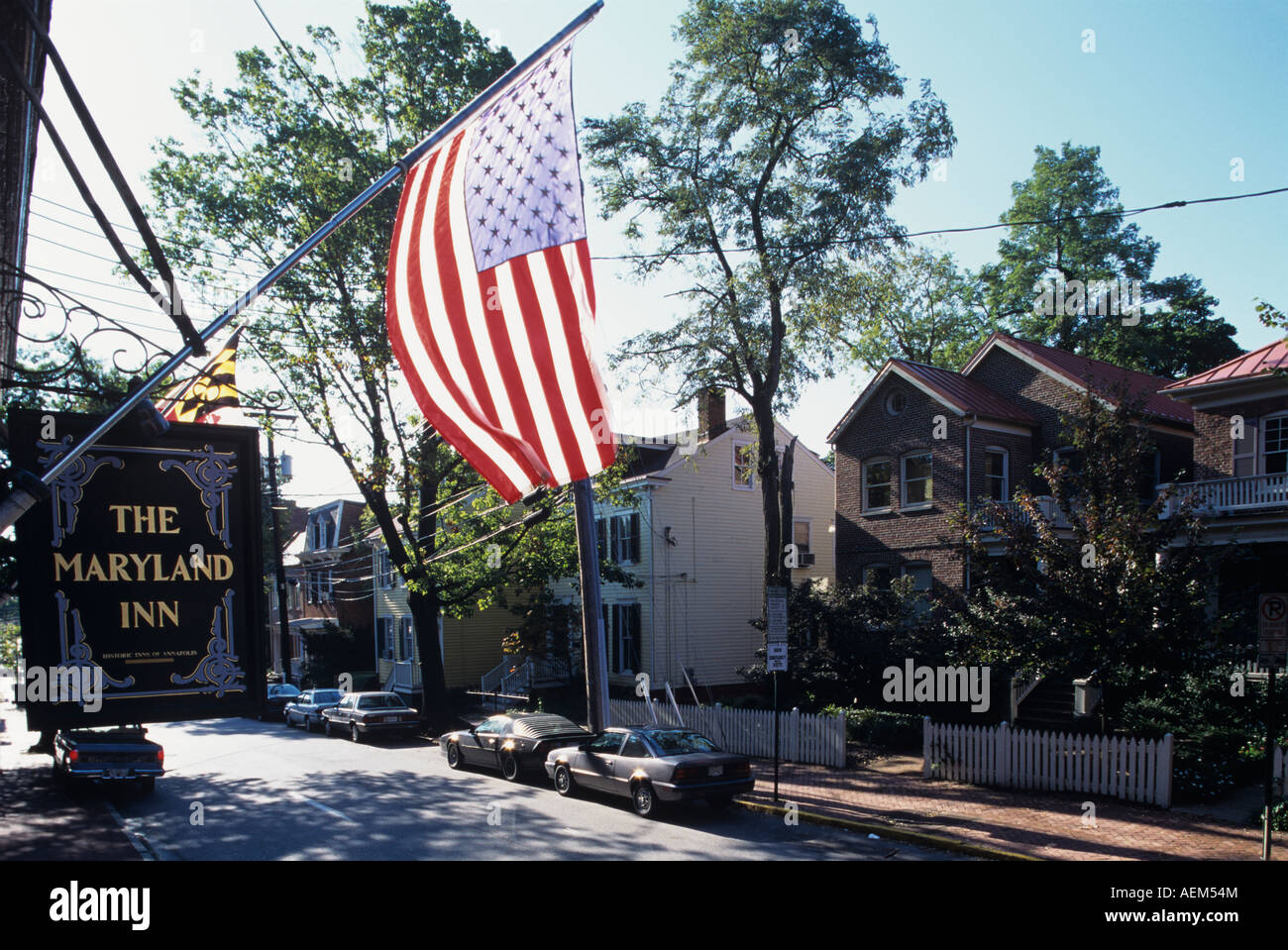 USA Maryland Annapolis American flag flies in front of B B in downtown ...