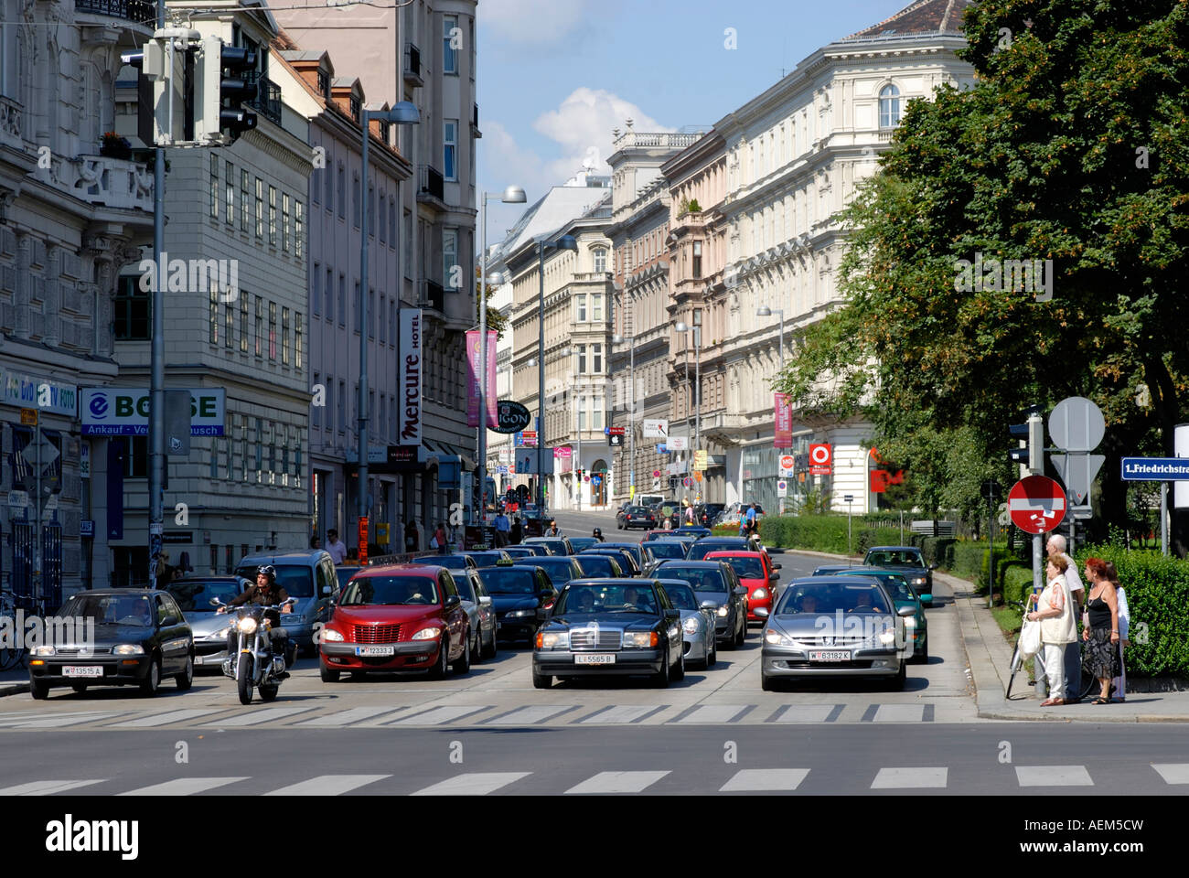 some cars stopped at a red light in vienna Stock Photo - Alamy