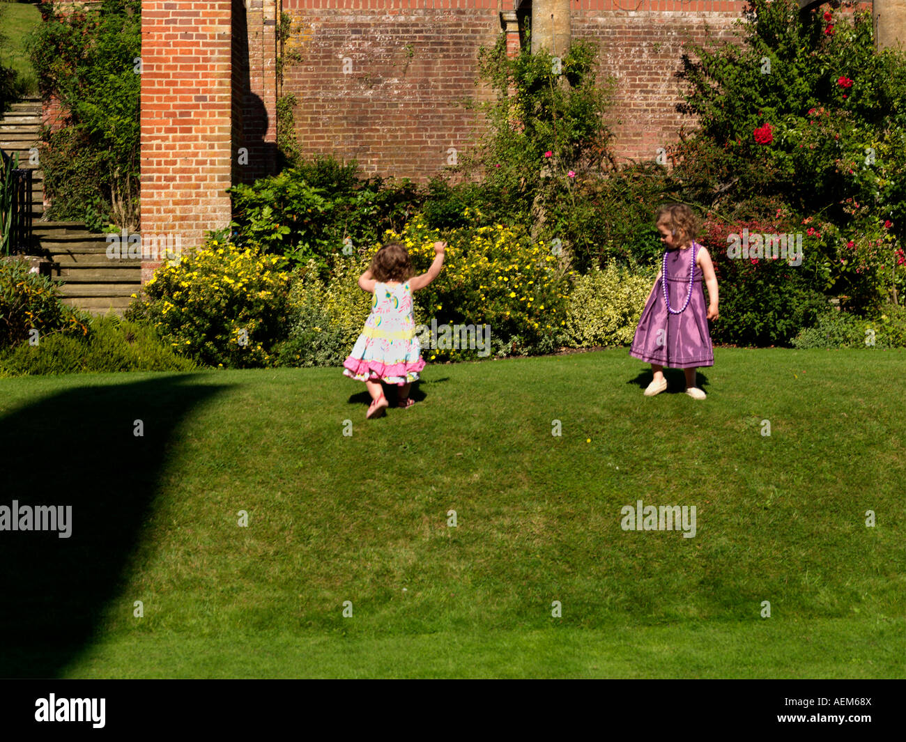 Children Playing in Garden at a Wedding Reception Stock Photo - Alamy