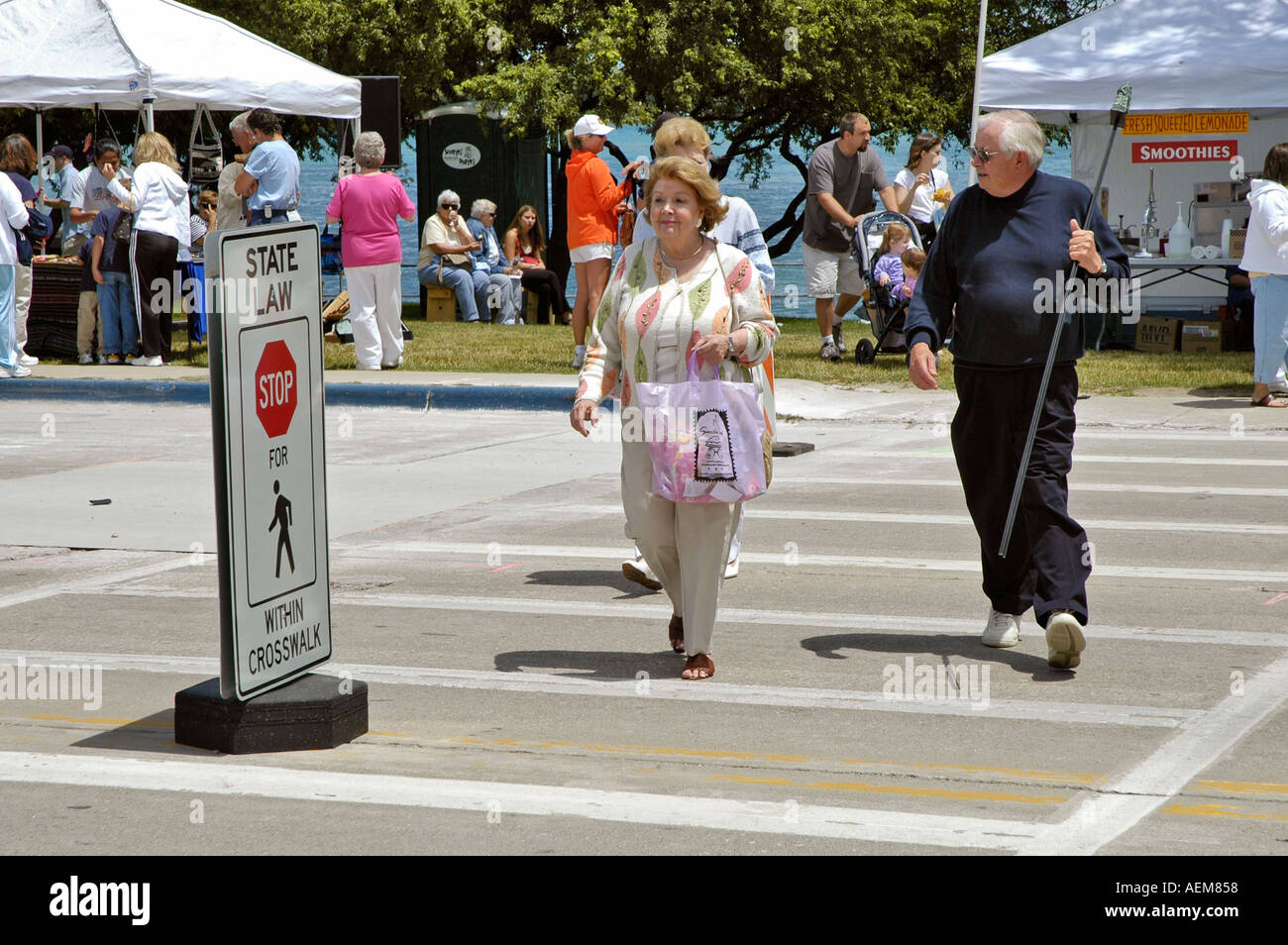 Sign in street stopping traffic safely allows pedestrians to cross ...