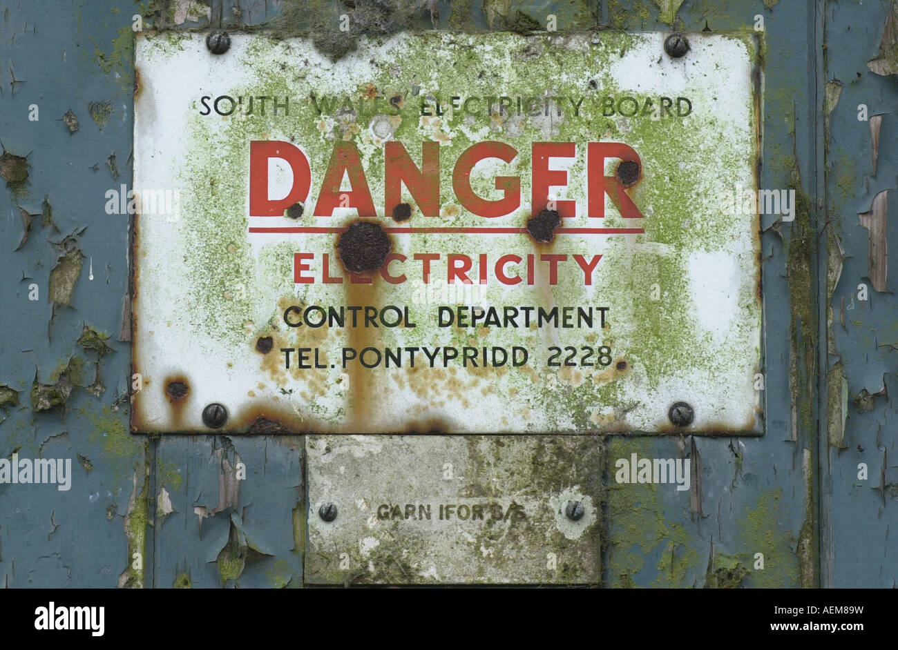 Old danger sign displaying the contact details of the former South ...