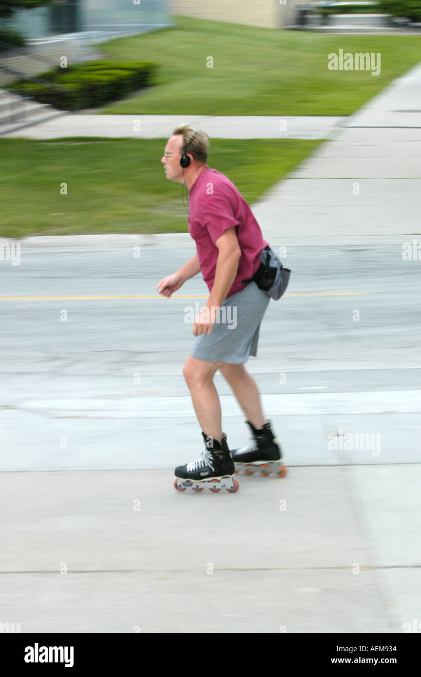Male roller blades hi-res stock photography and images - Alamy