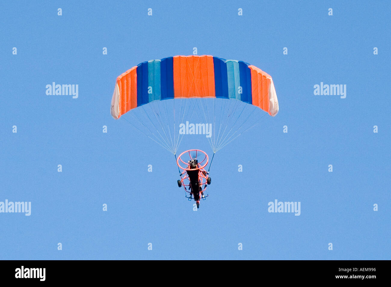 Paragliding with a motorized parachute Stock Photo - Alamy