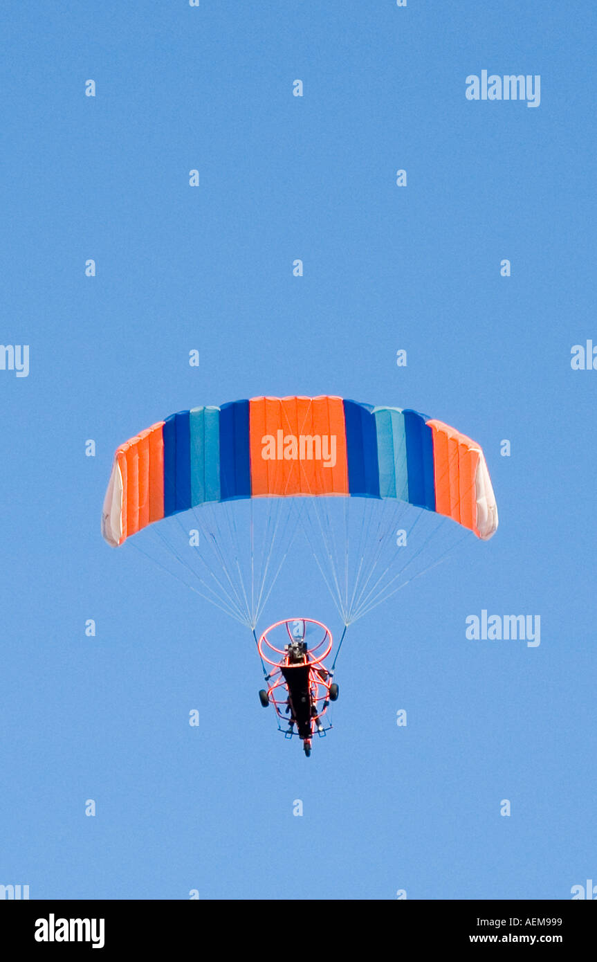 Paragliding with a motorized parachute Stock Photo - Alamy