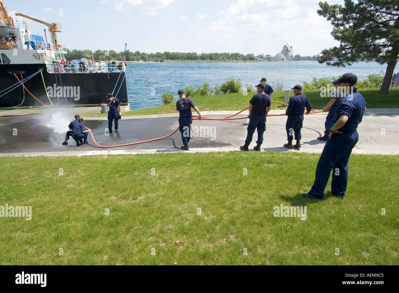 Coast Guard personnel from the ship Hollyhock stationed in Port Huron ...