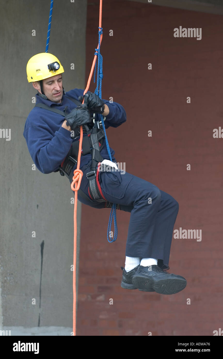 Fire fighters practice the art of repelling Stock Photo - Alamy