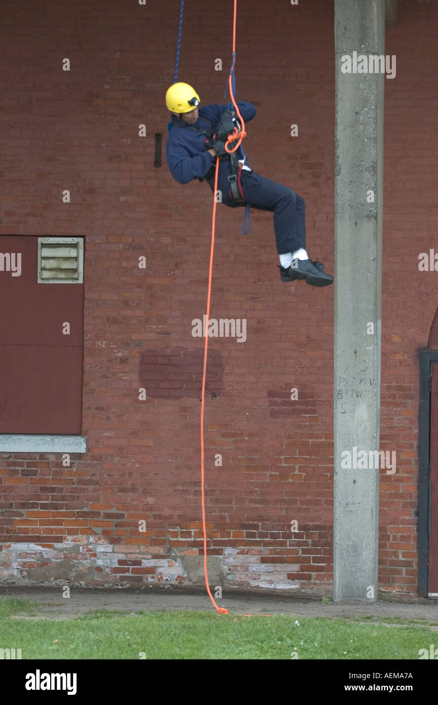 Fire fighters practice the art of repelling Stock Photo - Alamy
