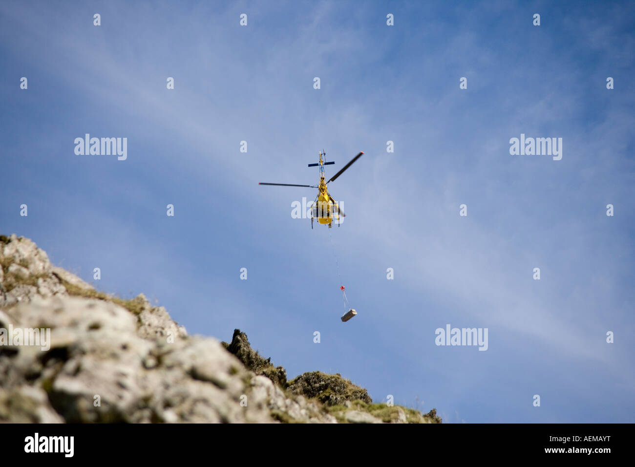 Helicopter flying material to build the new cafe on the top of Snowdon ...