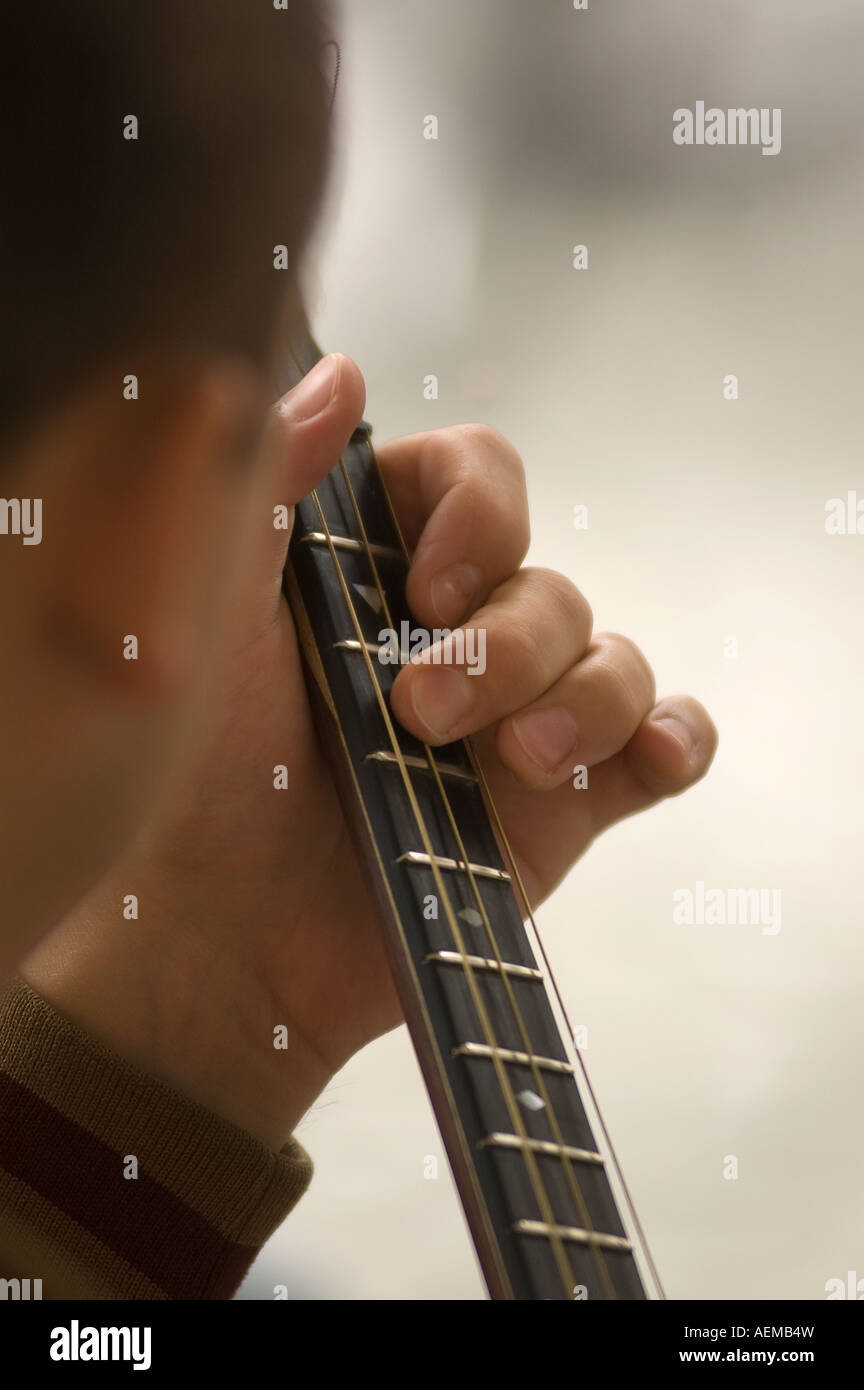 A musician play with an old string instrument Stock Photo - Alamy