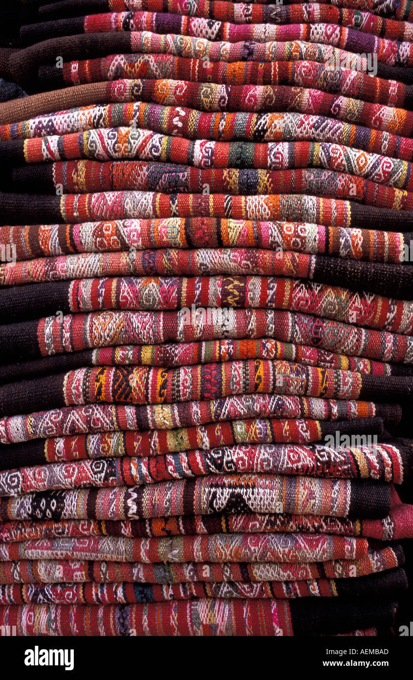 A stack of Bolivian woven woollen textiles as sold in markets of La Paz ...