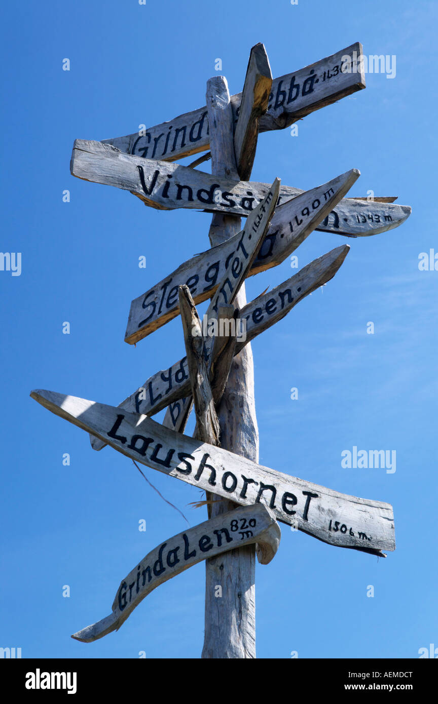Wooden finger post sign to walking destinations near Geiranger Stranda ...