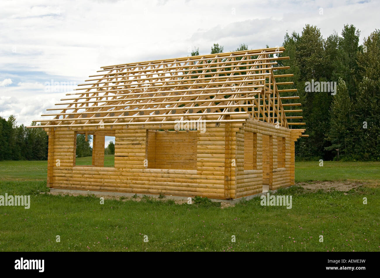 A Log Building under construction Stock Photo - Alamy