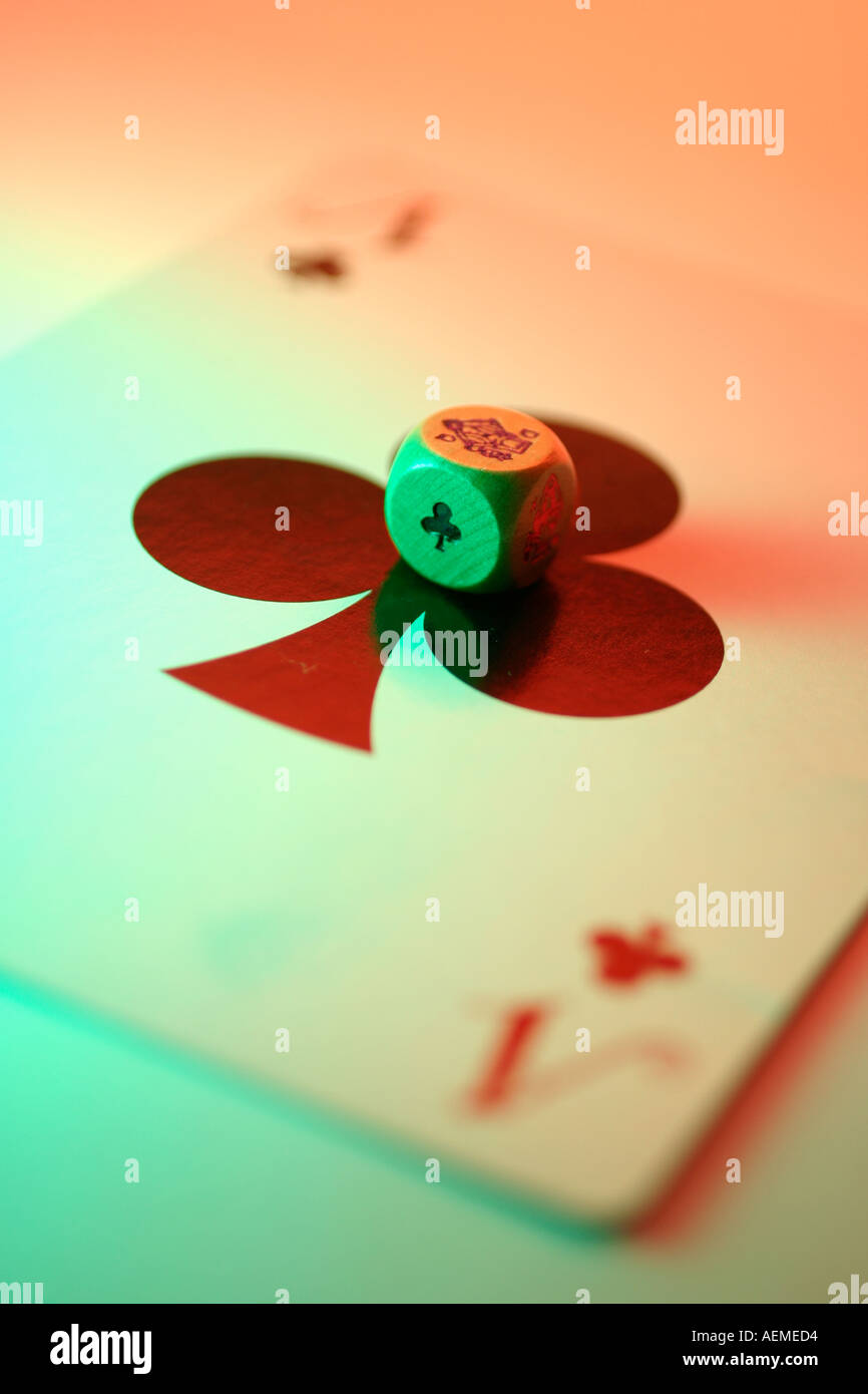 Dice on Playing Card Stock Photo - Alamy