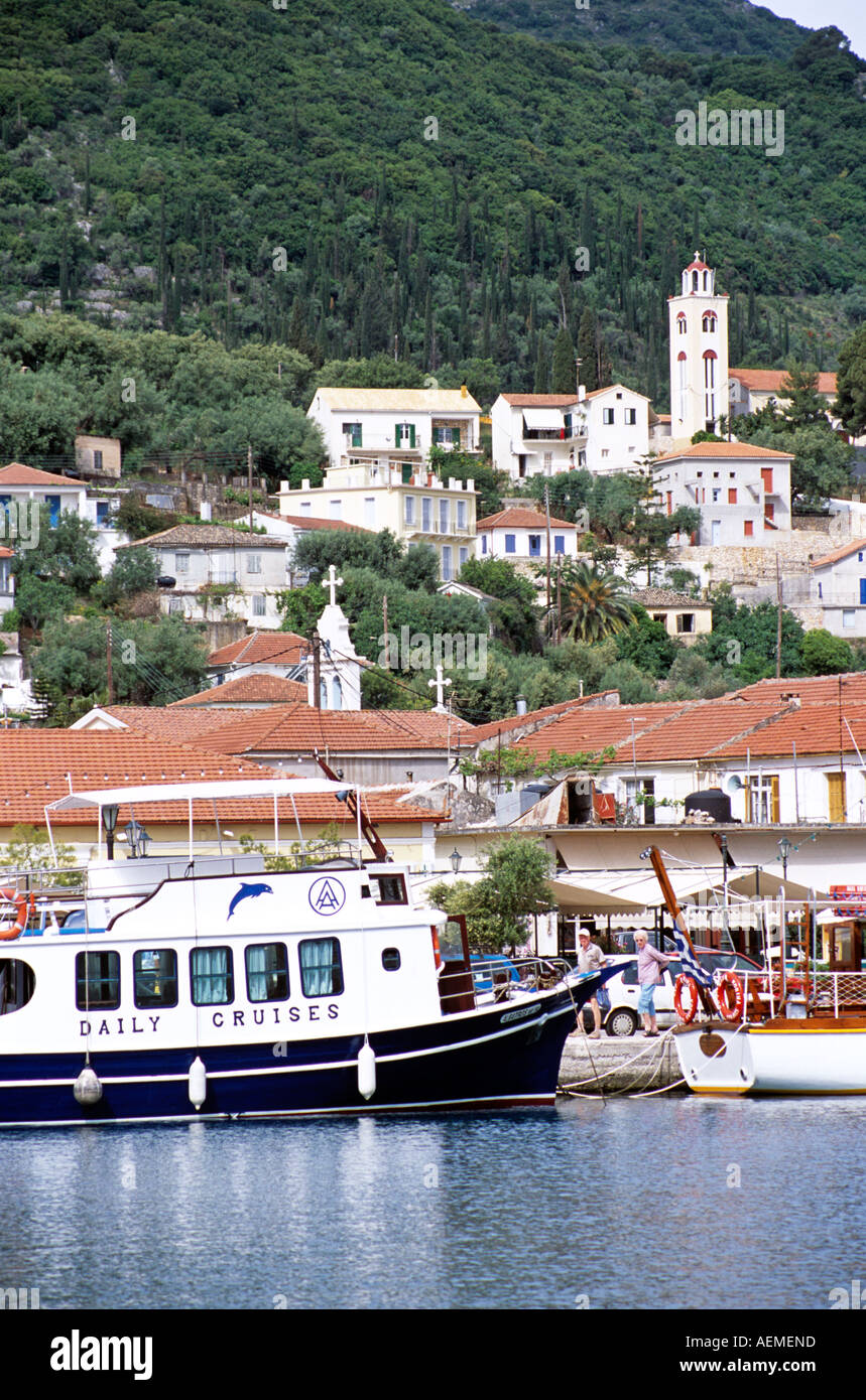 Cruise boat and Vathi town behind, Vathi, Ithaca, Greece Stock Photo ...