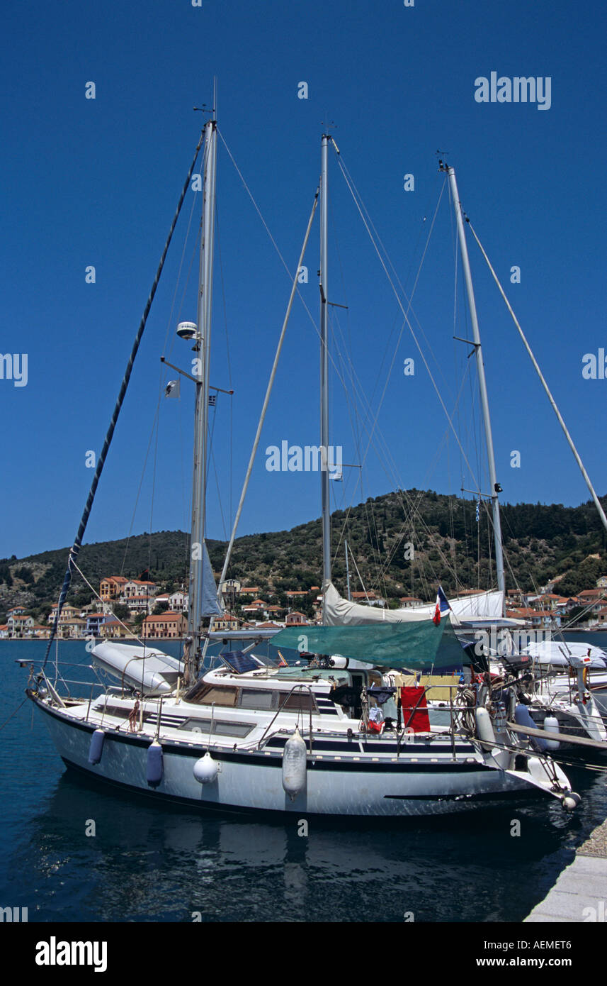 Moored yachts in harbour and Vathi town behind, Vathi, Ithaca, Greece ...