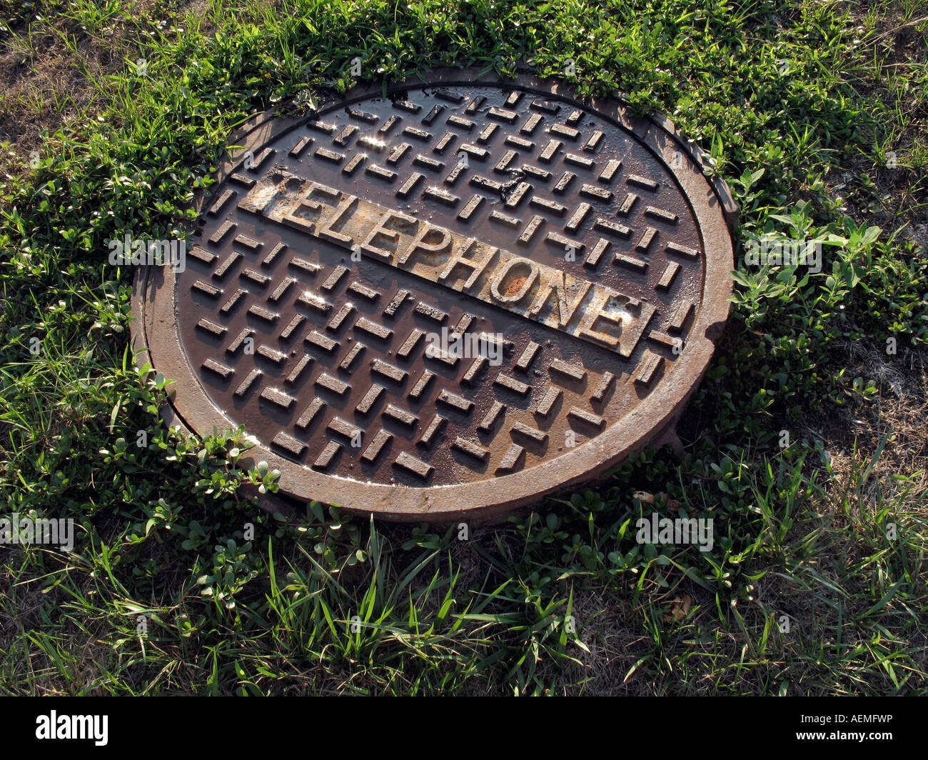 Telephone manhole cover hi-res stock photography and images - Alamy