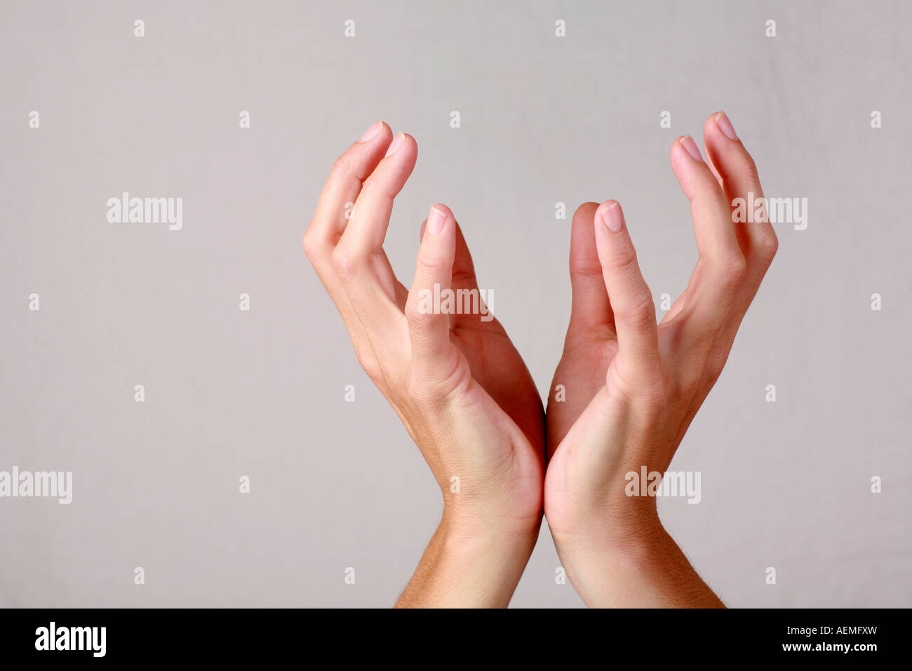 Hands held open reaching upwards sign of strength peace love unity ...