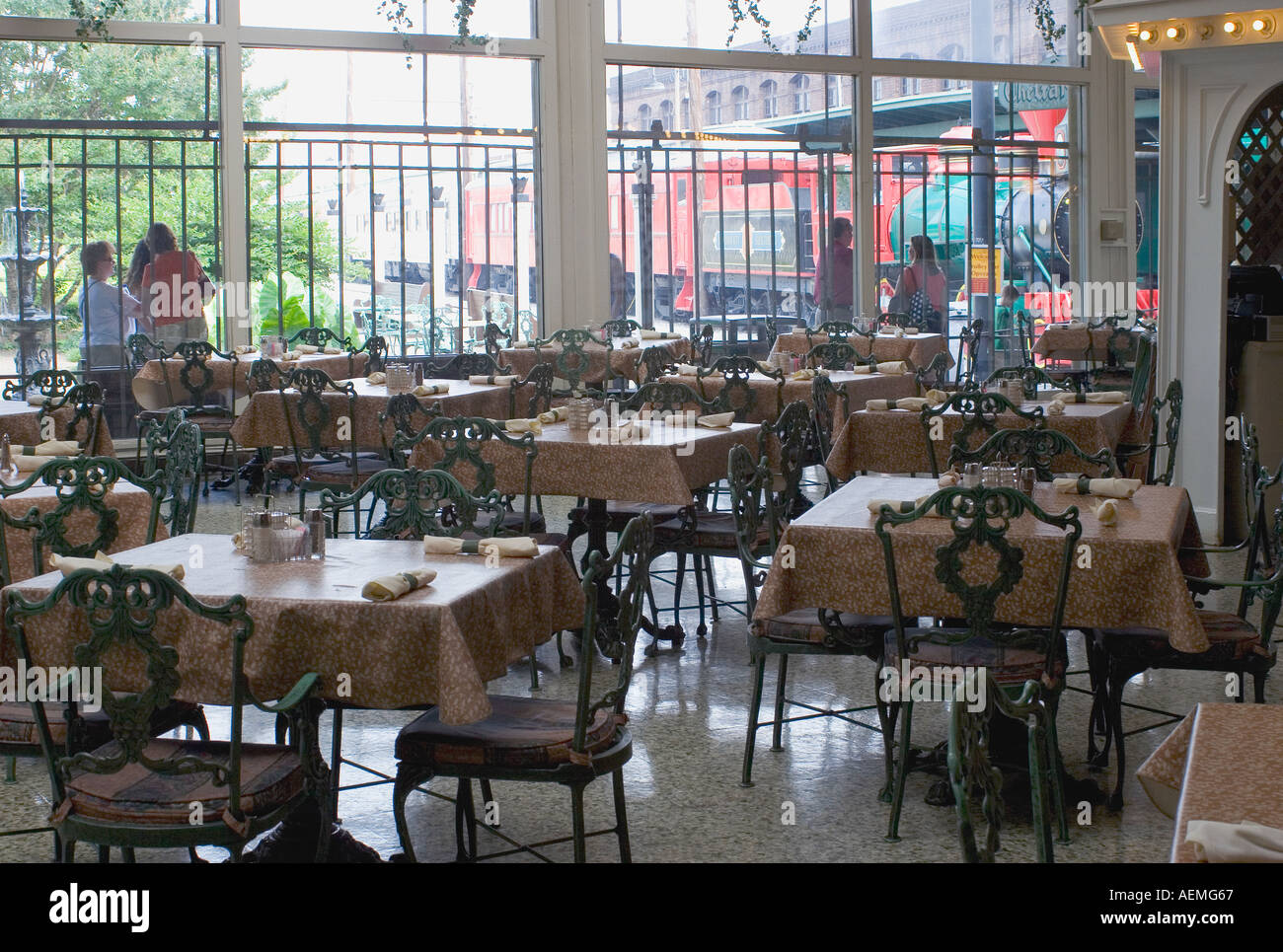 Interior of Restaurant in low light with train outside window USA Stock ...