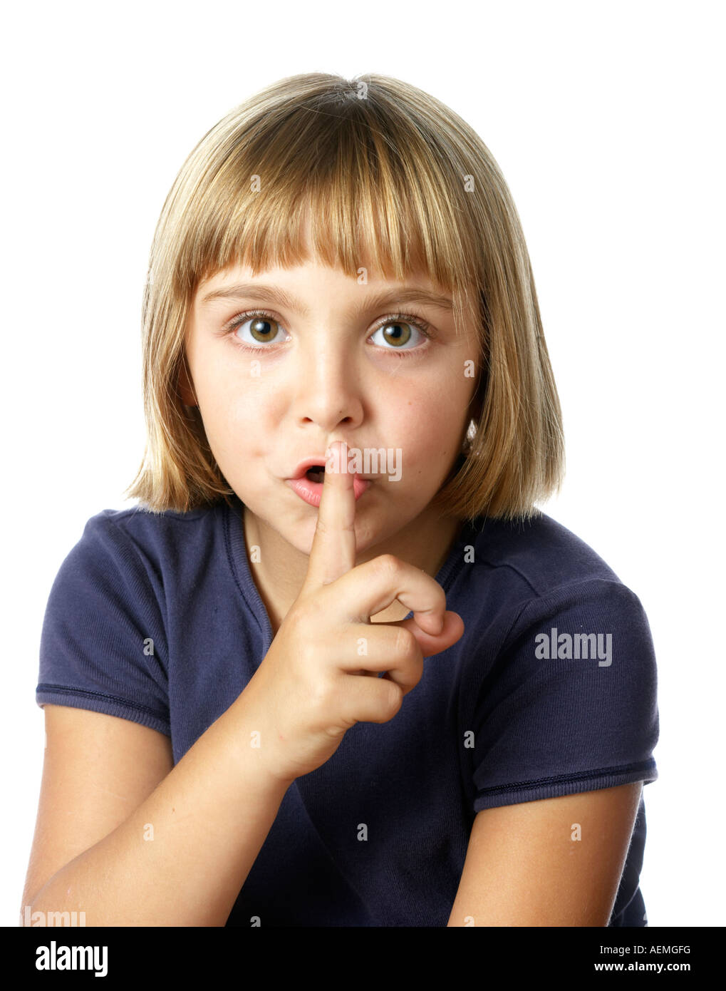 Serious girl keeping a secret Stock Photo - Alamy