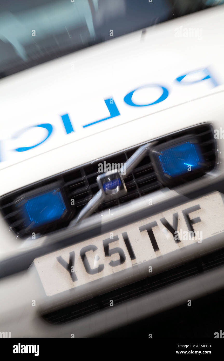 Police car travelling at speed 999 911 emergency service arrest Volvo ...