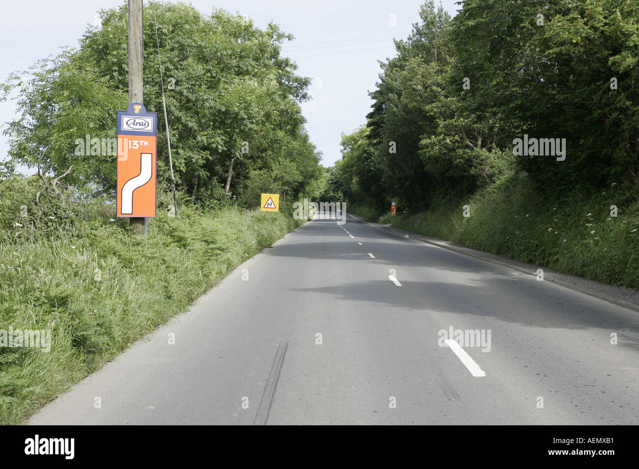 13th Milestone on the isle of man TT course IOM Stock Photo - Alamy