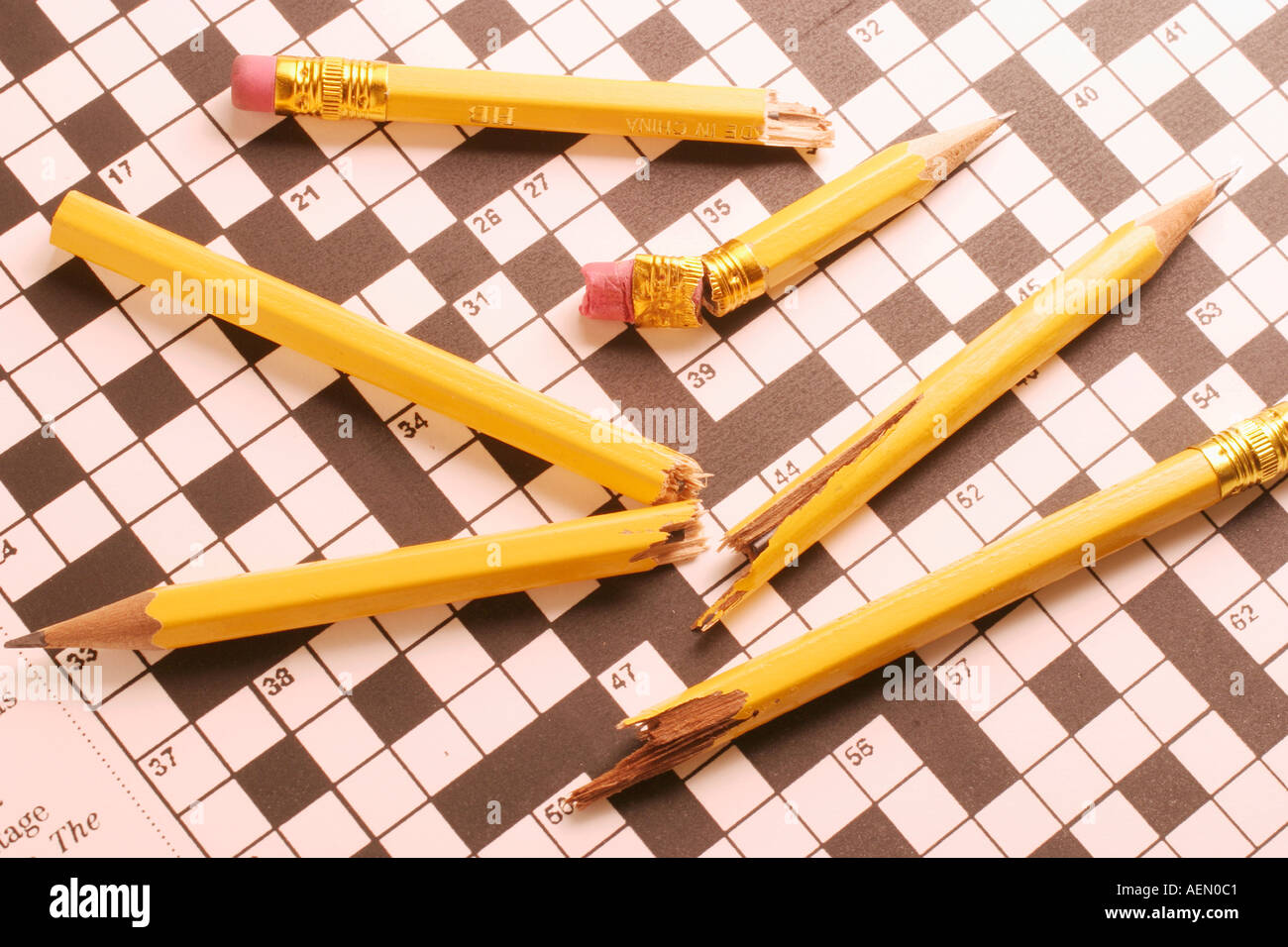 Broken Pencils on Crossword Puzzle Stock Photo - Alamy