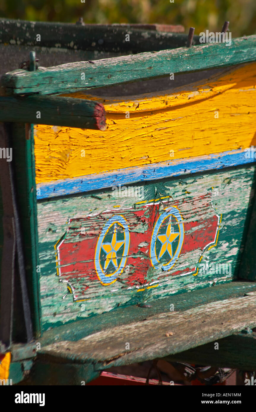 An old colourful and painted farm cart. Herdade da Malhadinha Nova ...