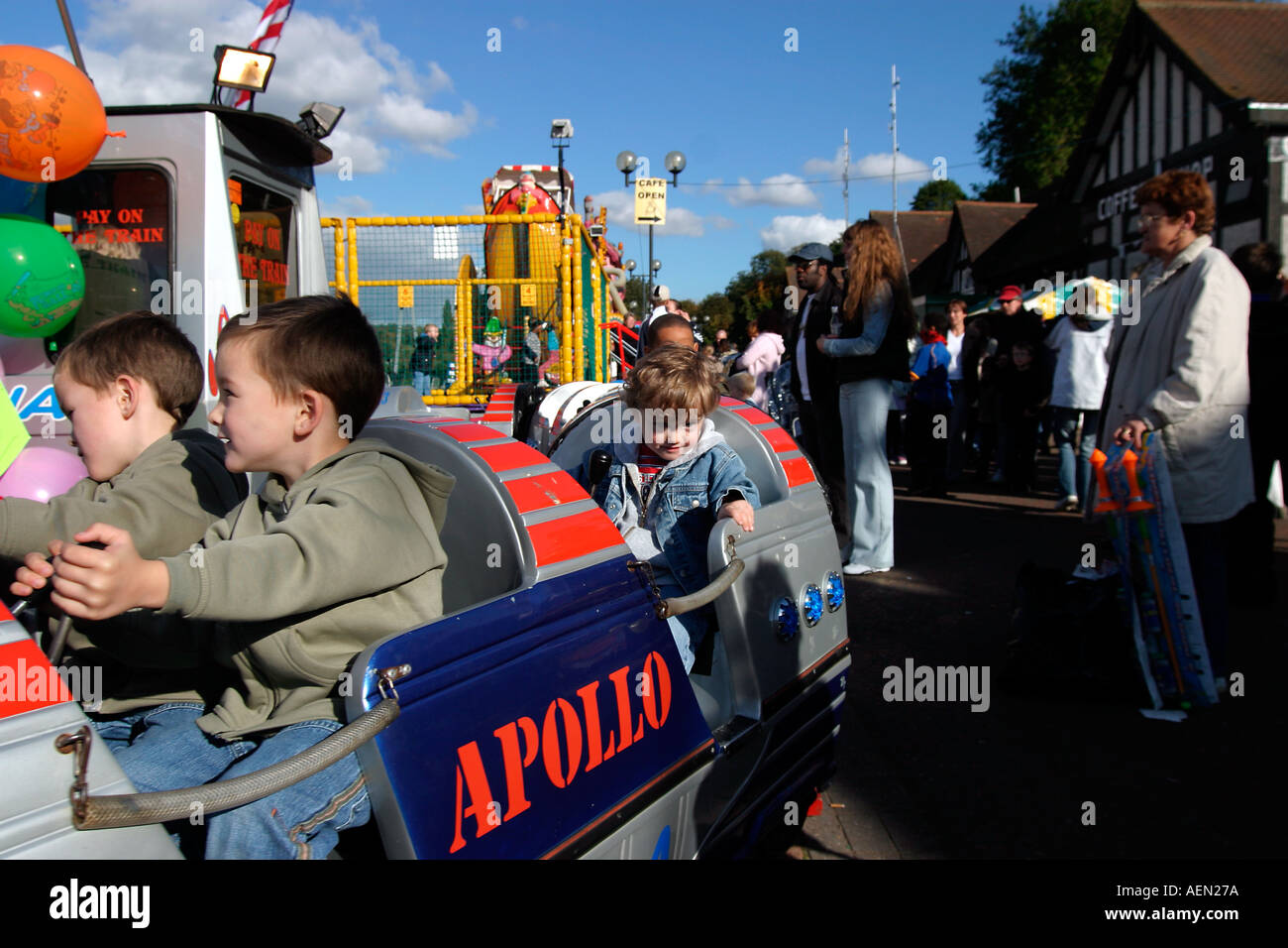 Children on a roundabout at a fun fair hi-res stock photography and ...